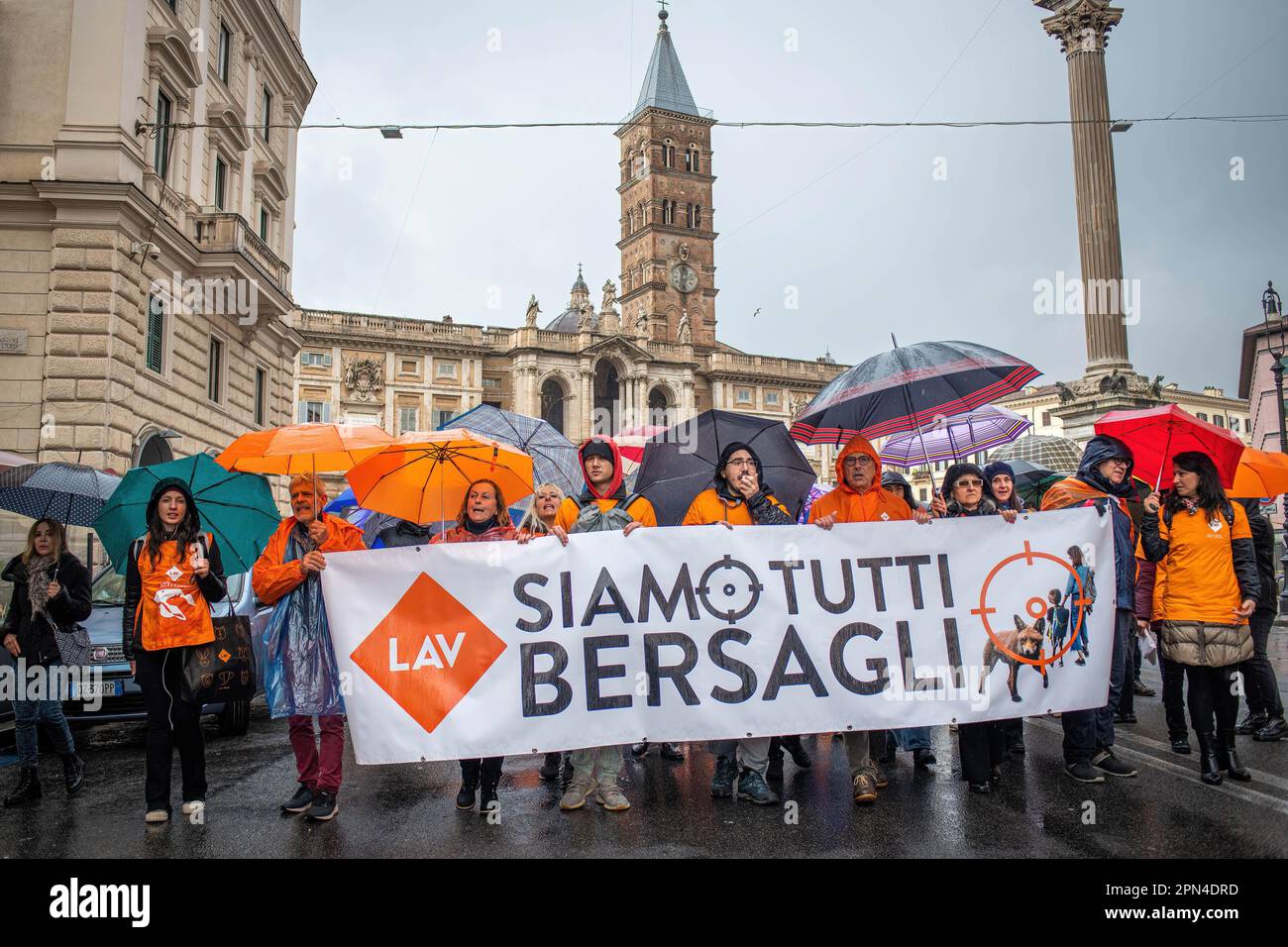 Animal rights activists hold a banner during the demonstration ...