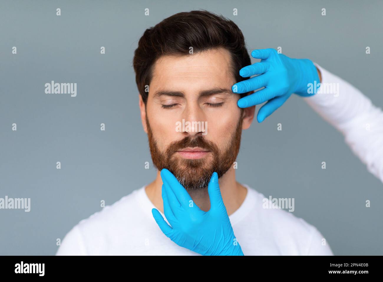 Portrait of bearded middle aged man getting prepared for plastic ...