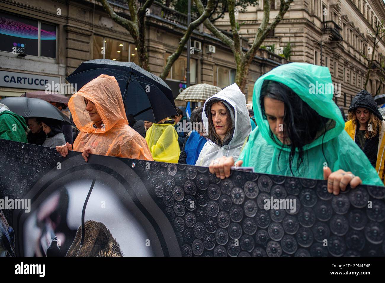 Animal rights activists hold a banner during the demonstration ...