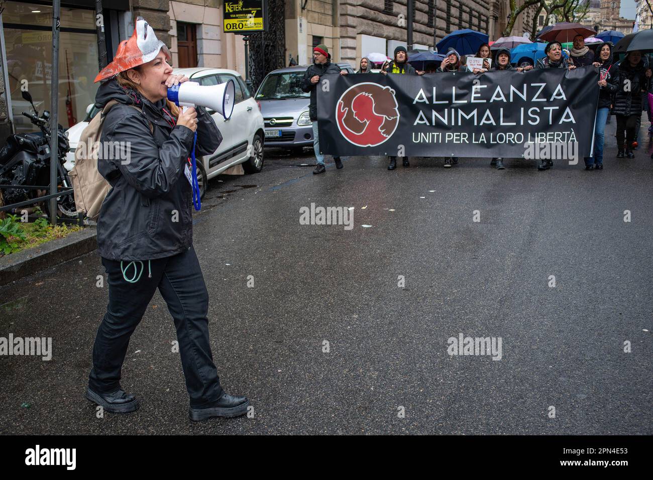 Animal rights activist with a wolf mask and megaphone takes part during ...