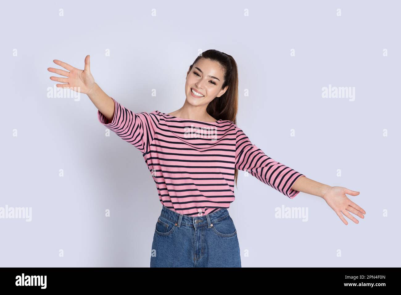 Joyful hispanic woman open arms hi-res stock photography and images - Alamy