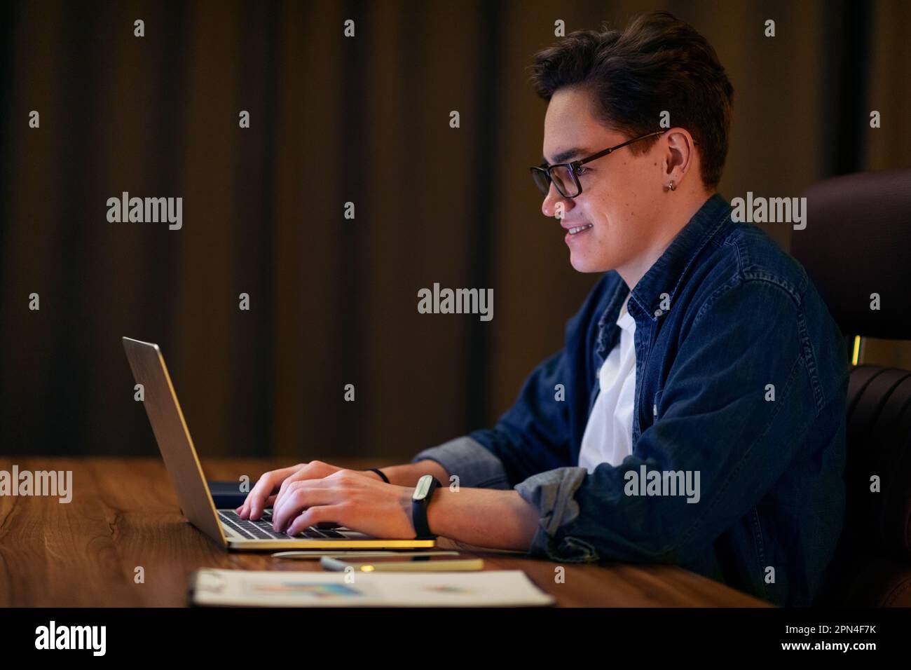 Eyeglasses man developer typing keyboard hi-res stock photography and ...