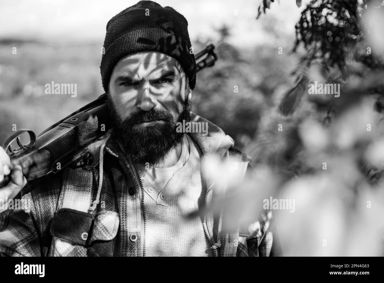 Hunter with shotgun gun on hunt. Close up Portrait of hamdsome Hunter ...