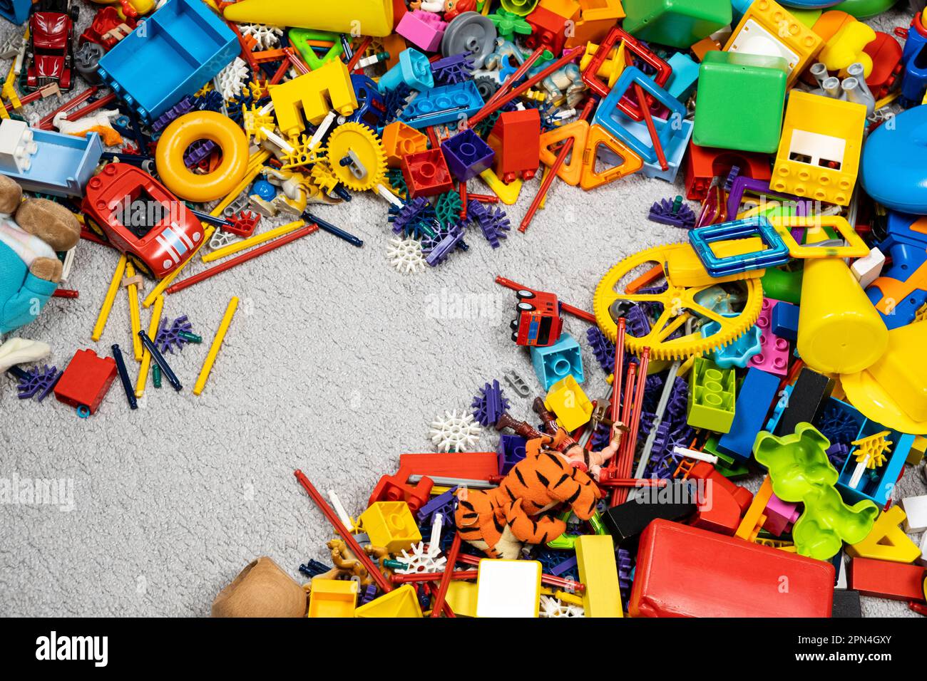 An abundance of toys in the children's room, a lot of plastic multi ...