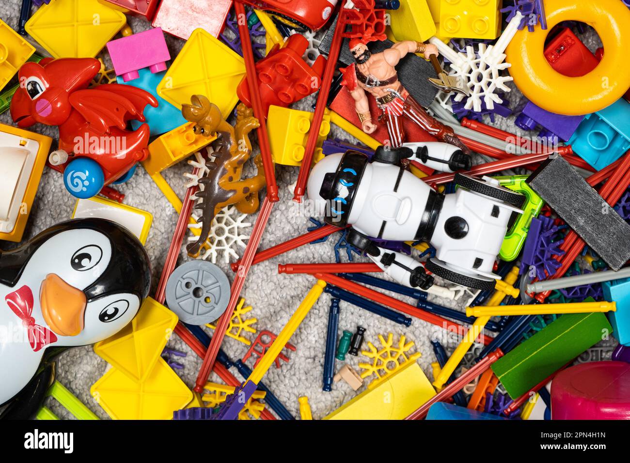 An abundance of toys in the children's room, a lot of plastic multi ...