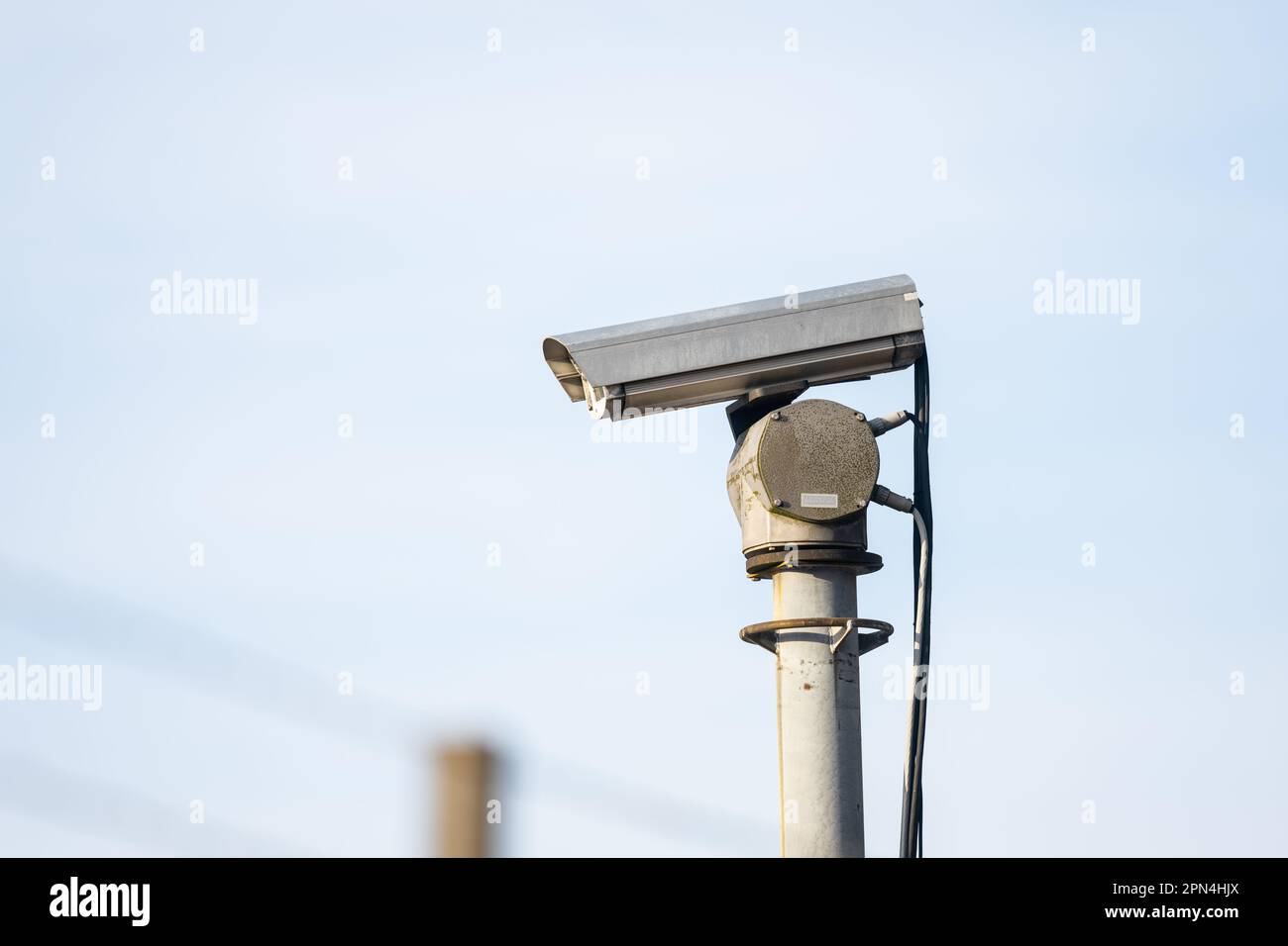 Remotely controlled CCTV camera on top of a pole Stock Photo - Alamy