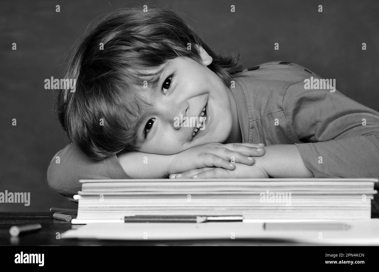 Back to school and happy time. Kid is learning in class on background ...