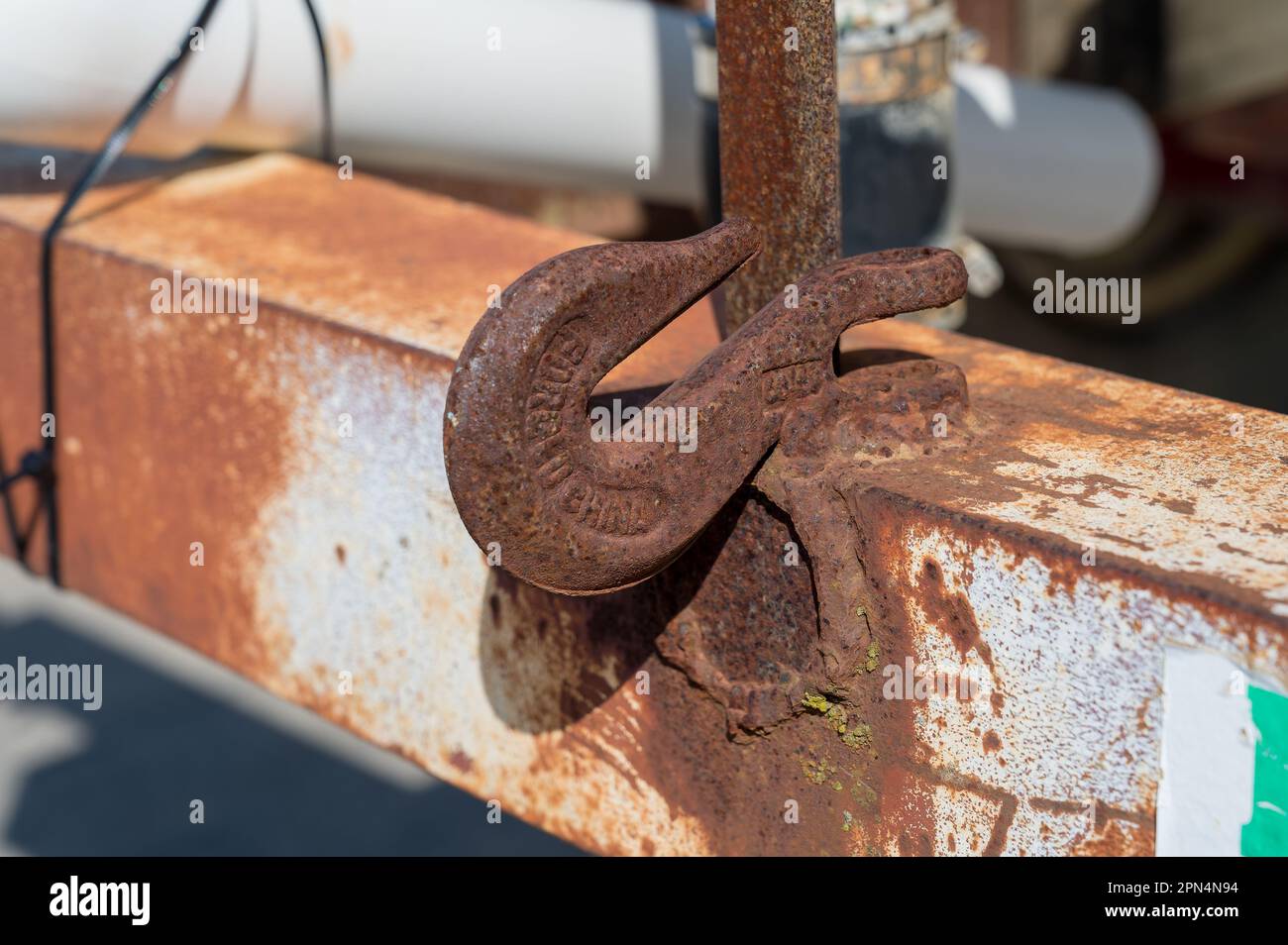 Steel hook welded onto a bumper used to secure a chain on equipment ...