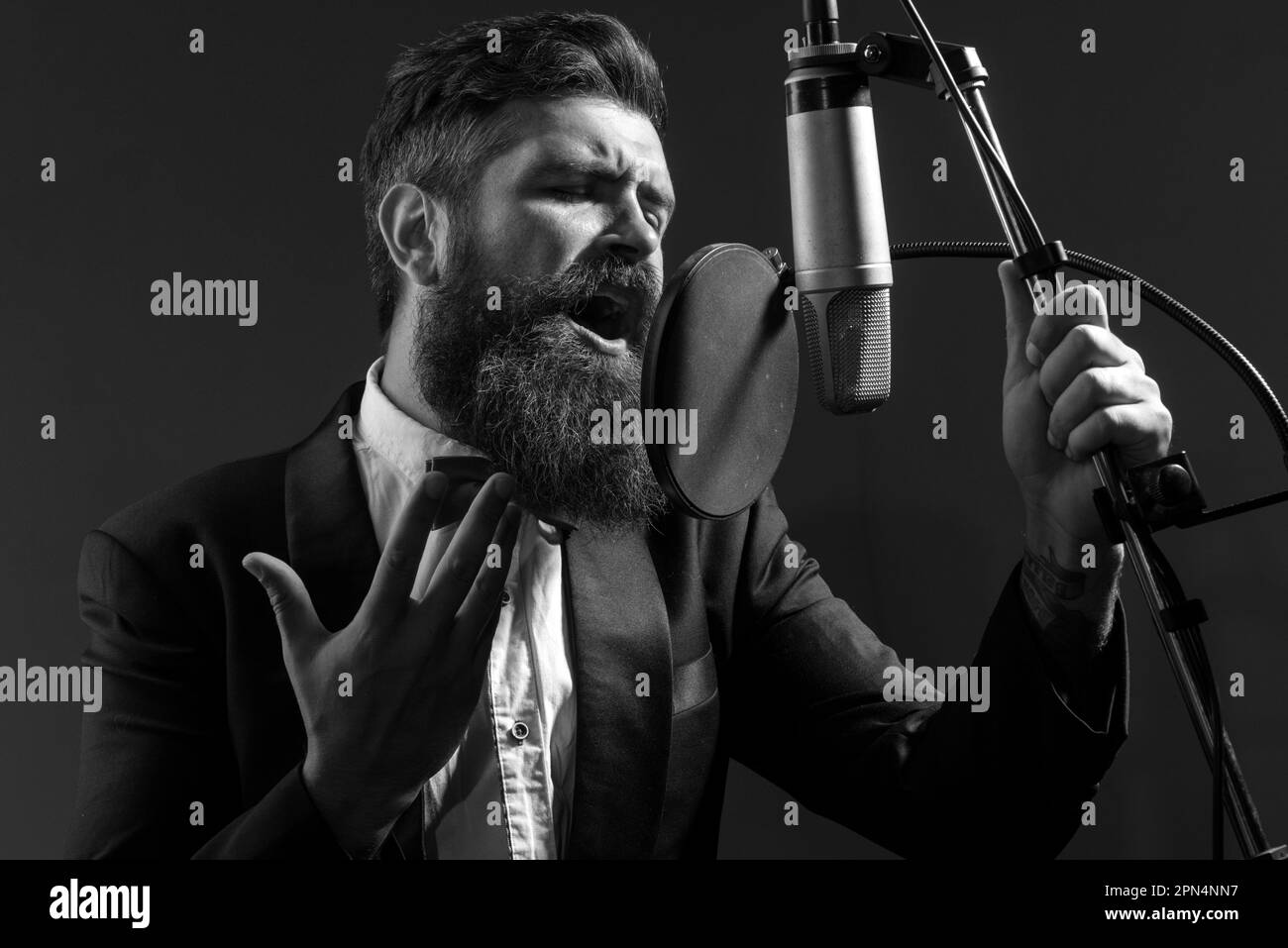 Man singing in recording studio Black and White Stock Photos & Images ...
