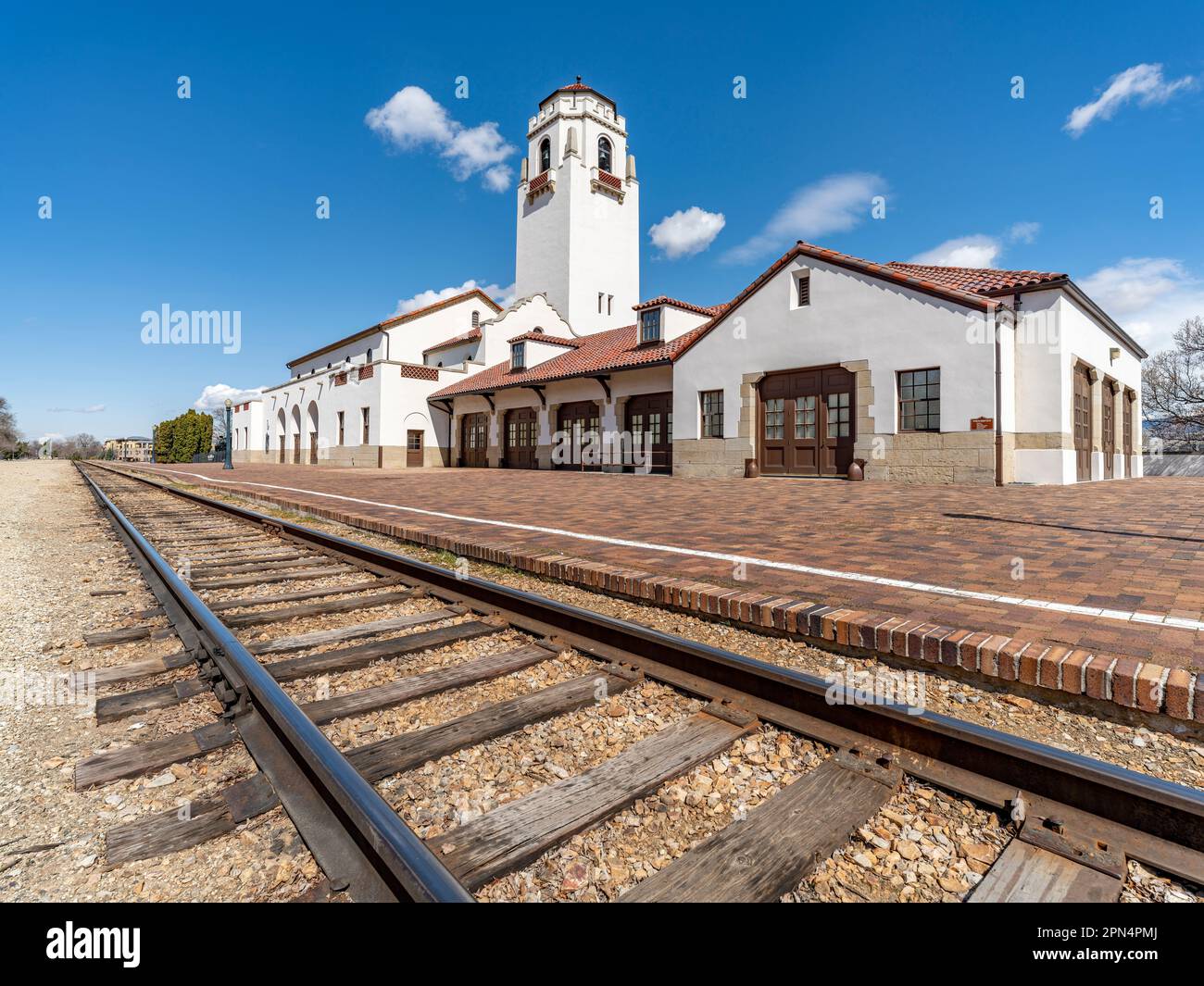 Railroad tracks and loading deck at a local train depot Stock Photo - Alamy