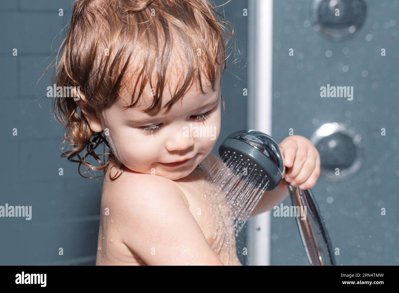 Little baby taking bath, closeup face portrait of smiling boy, health ...