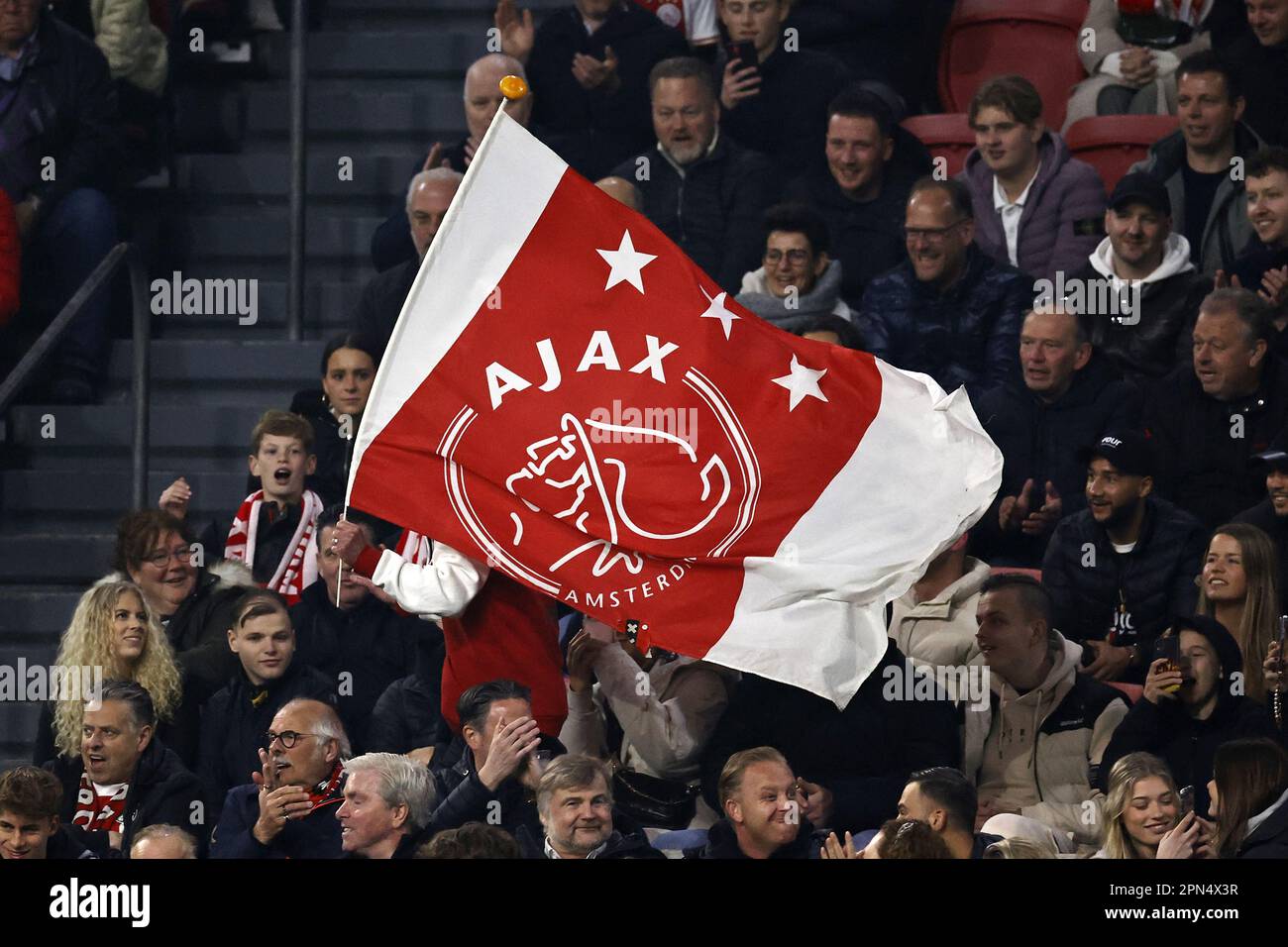 AMSTERDAM - Fan with an Ajax flag in the stands during the Dutch ...