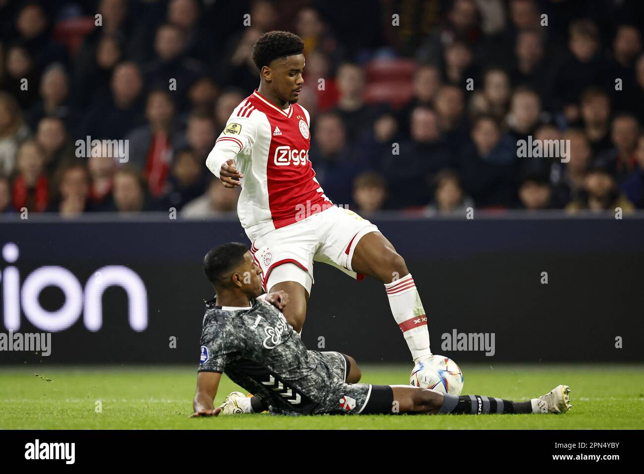 AMSTERDAM - (LR) Jorrel Hato of Ajax, Miguel Araujo of FC Emmen during ...