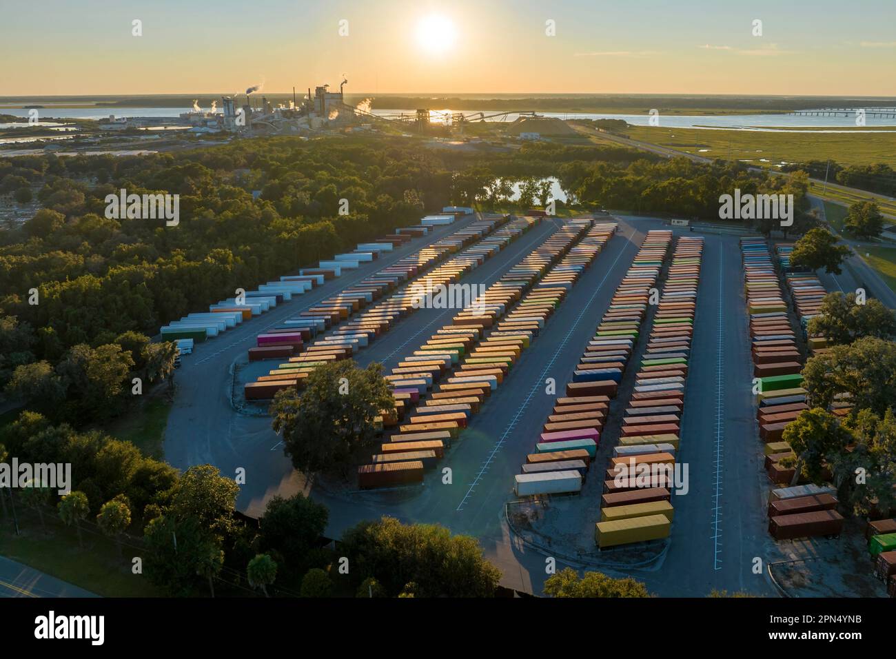 Aerial view of large cargo container yard with rows of freight ...
