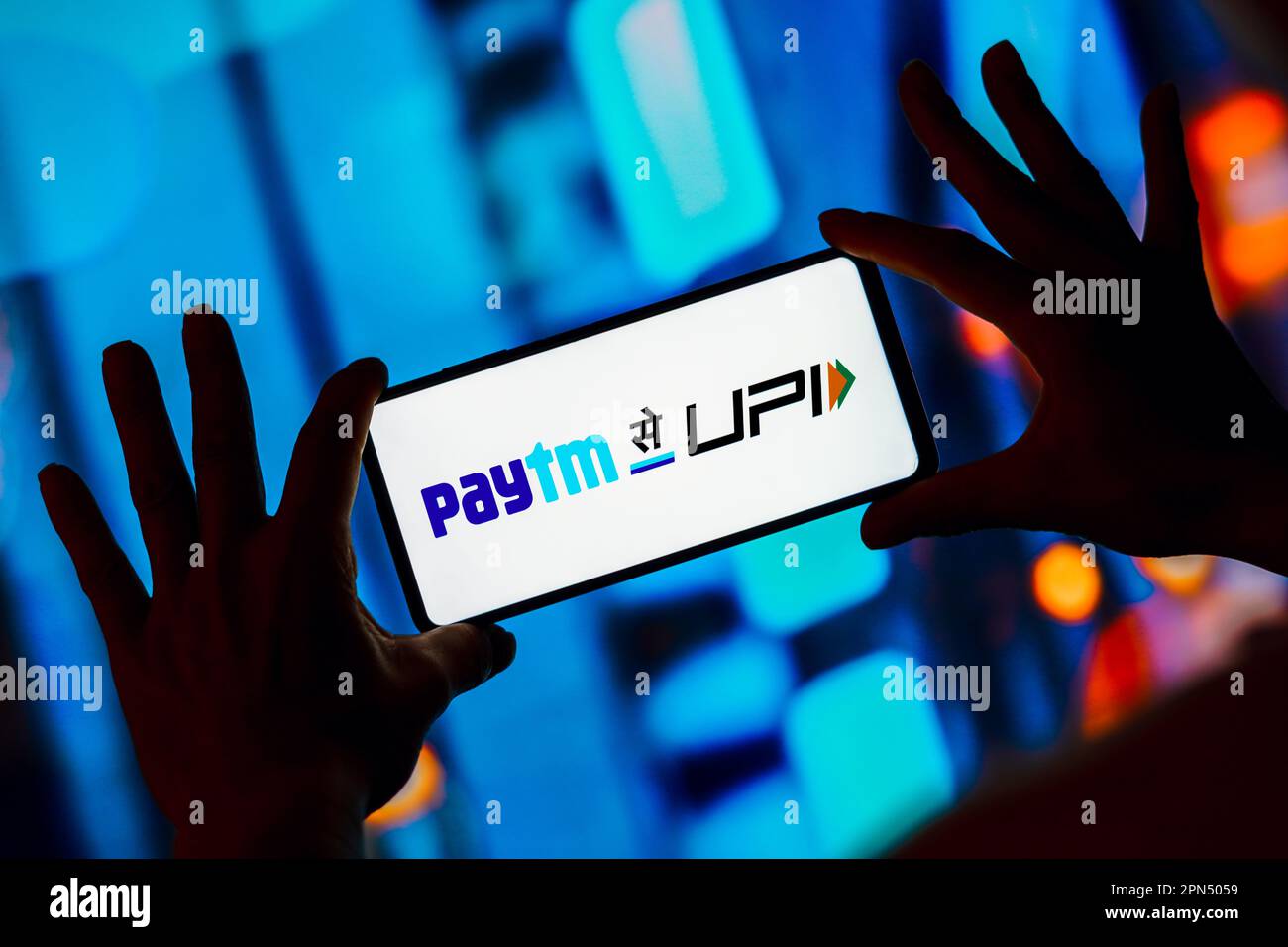 In this photo illustration, the Paytm logo is displayed on a smartphone ...