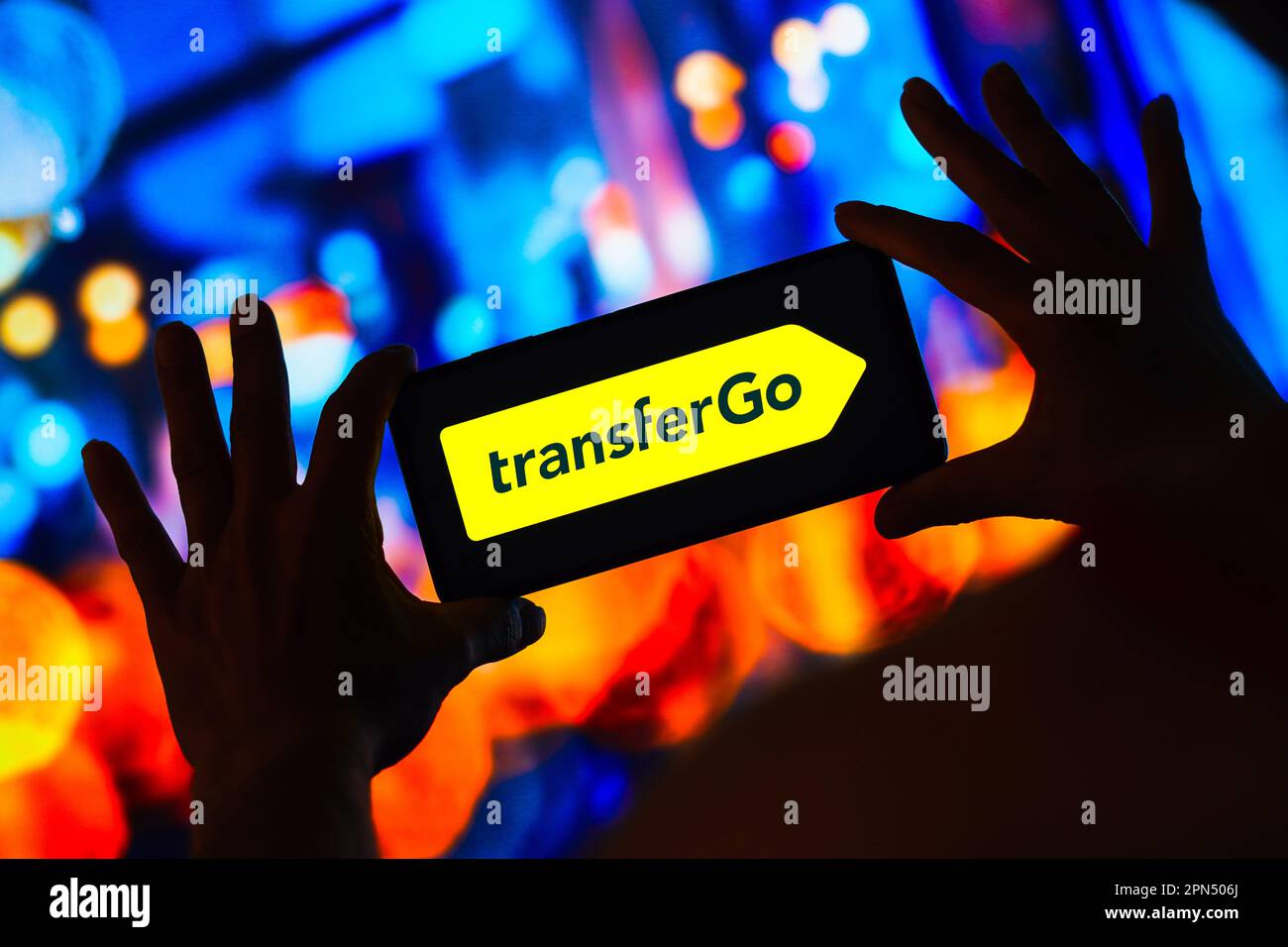 In this photo illustration, the TransferGo logo is displayed on a ...