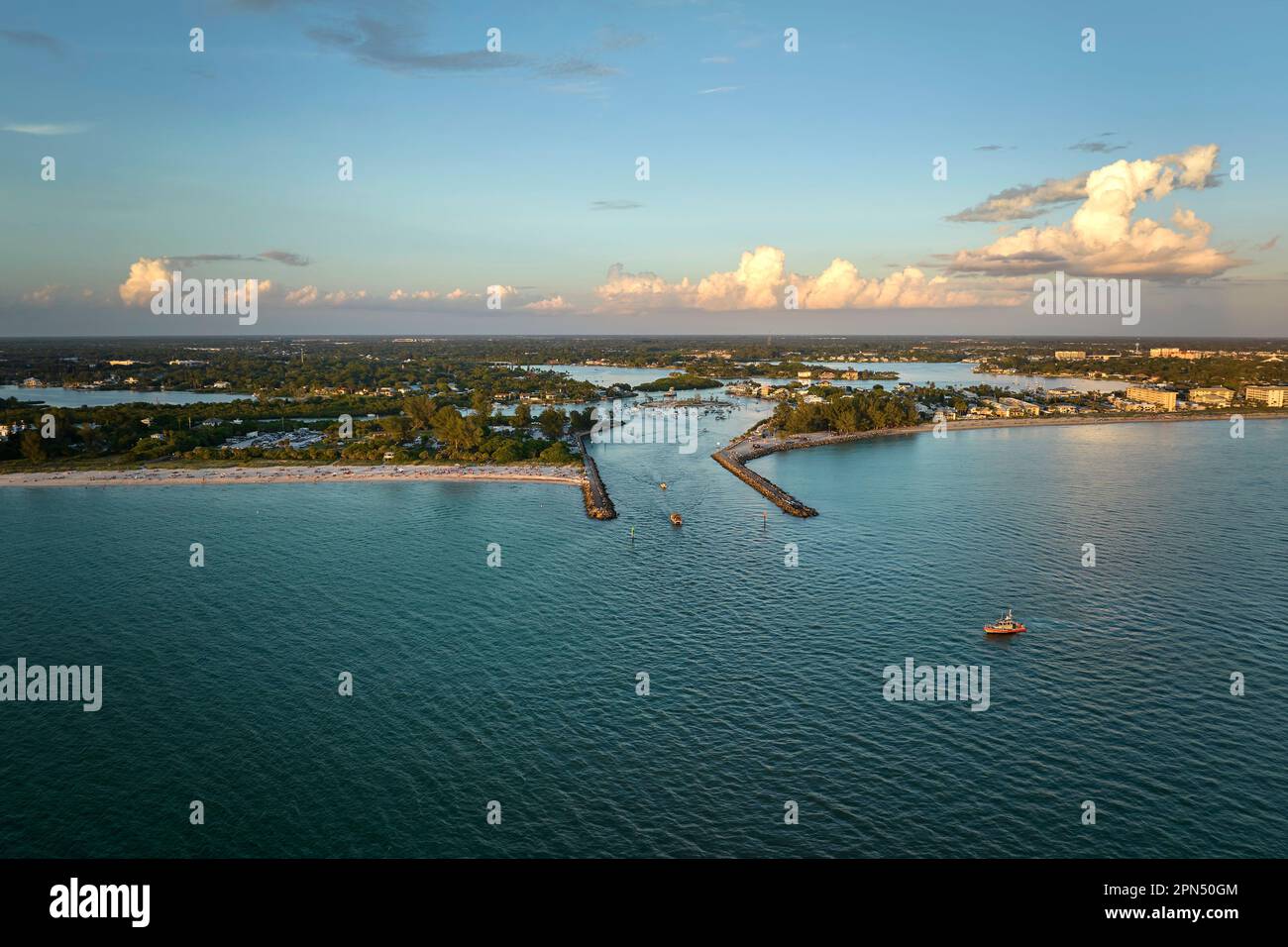 Aerial view of sea shore near Venice, Florida with white yachts at ...