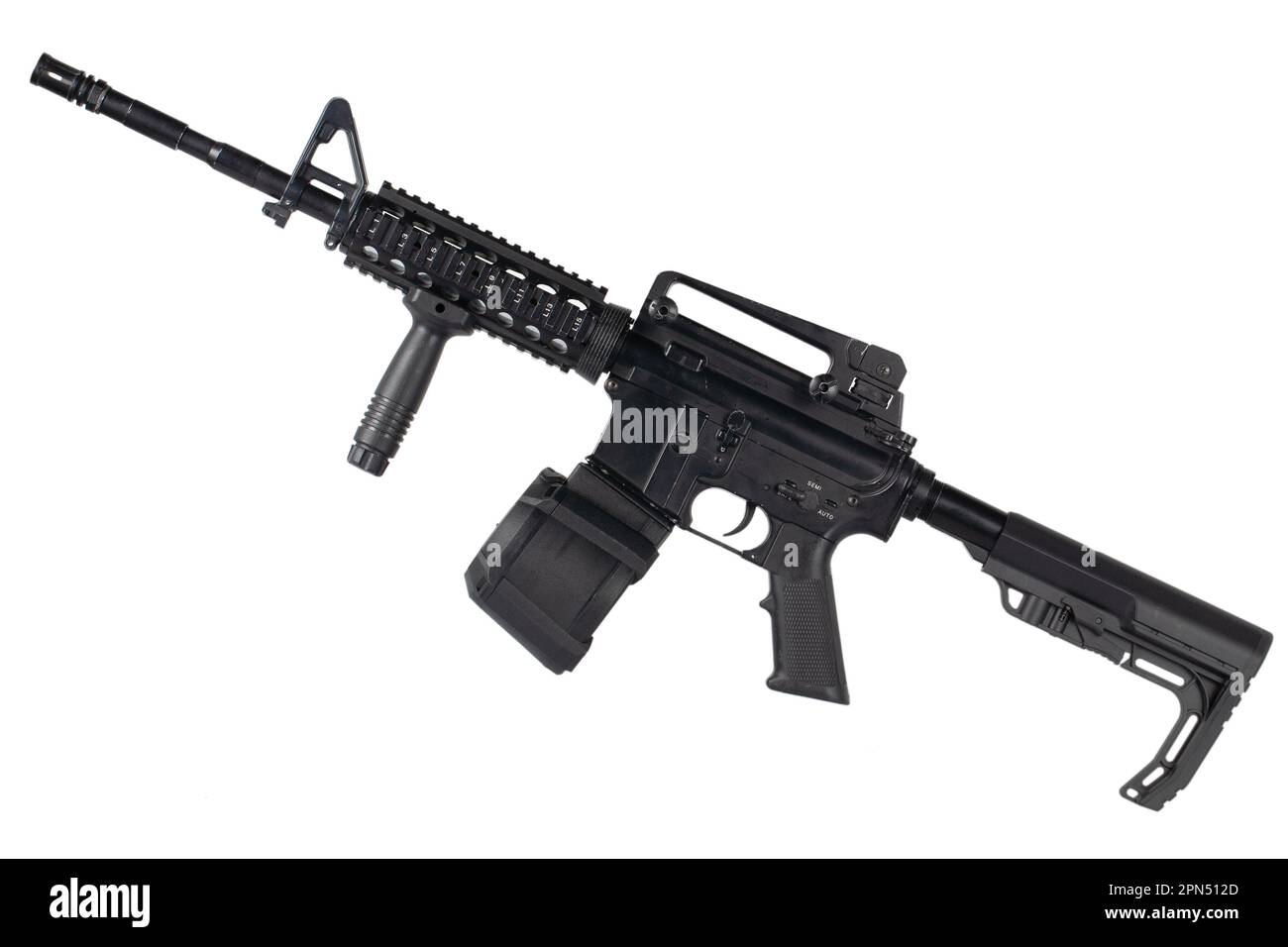 M4 assault rifle with drum magazine isolated on a white background ...