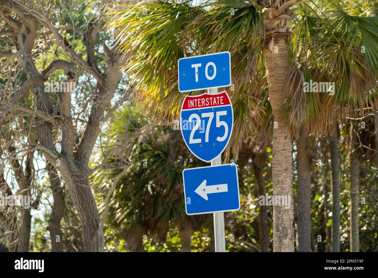 Blue direstional road sign indicating direction to I-275 freeway ...