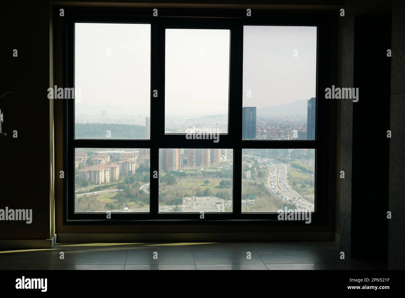 Empty interior with large window Stock Photo - Alamy