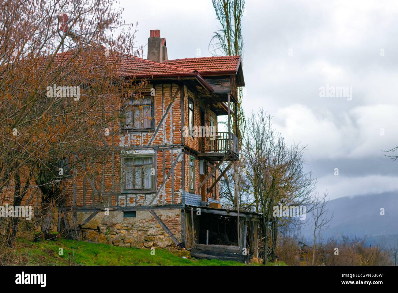 A photograph of an Anatolian Turkish house captured with a view of high ...