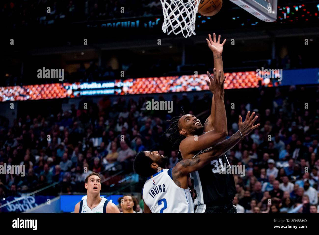 San Antonio Spurs forward Keita Bates-Diop (31) goes up for a layup as ...