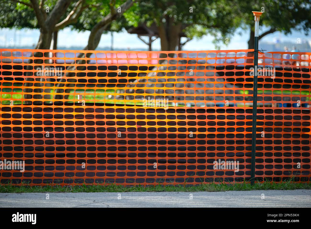 Restriction plastic mesh fence at industrial construction site ...