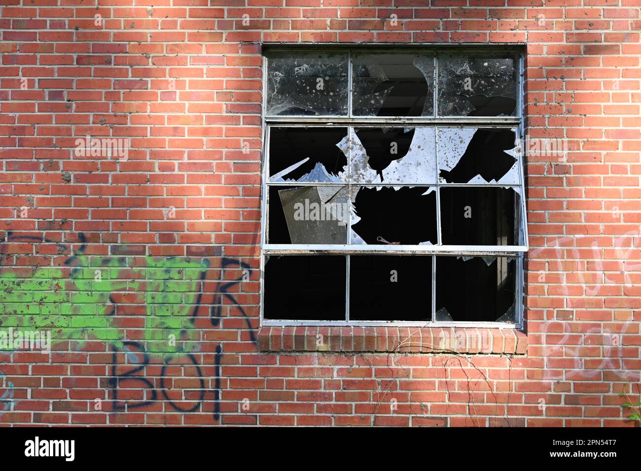 A broken windows at a school that has been abandoned since 2001 Stock ...