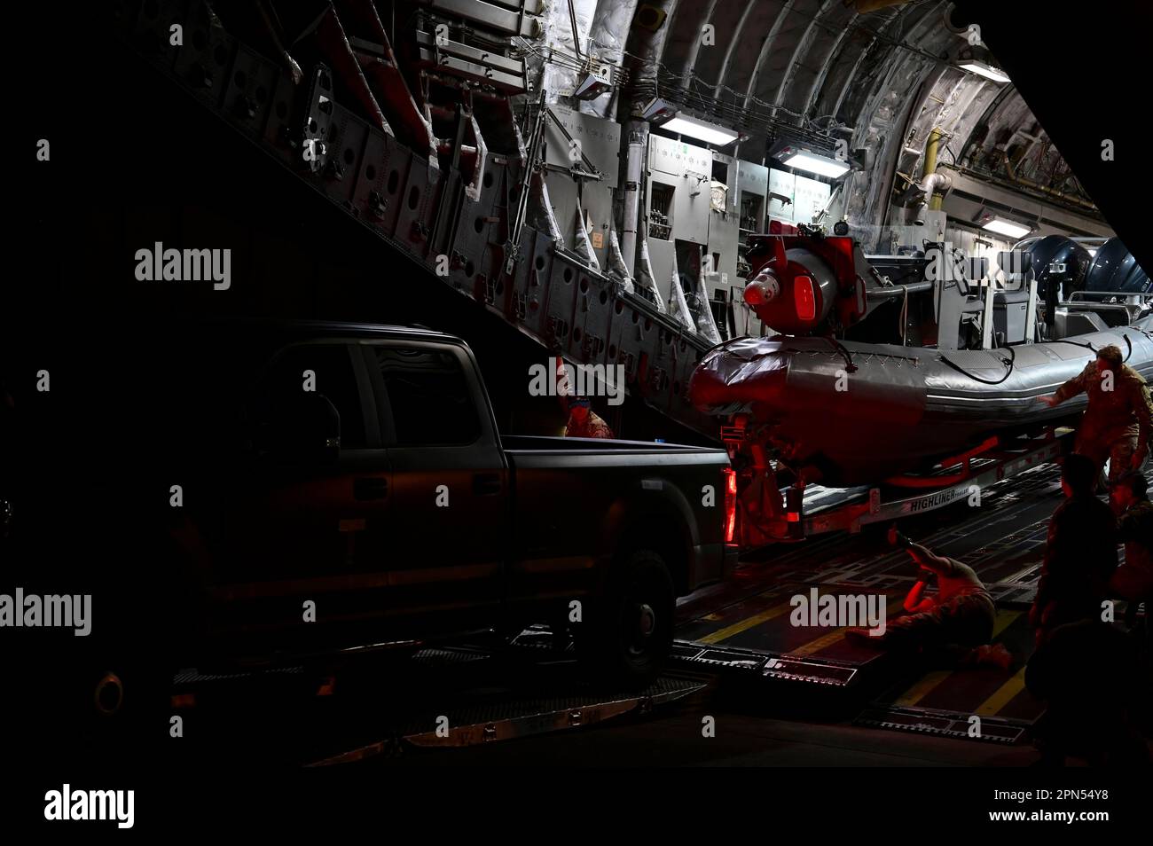 Aircrew assigned to the 144th Airlift Squadron, unload a 212th Rescue ...