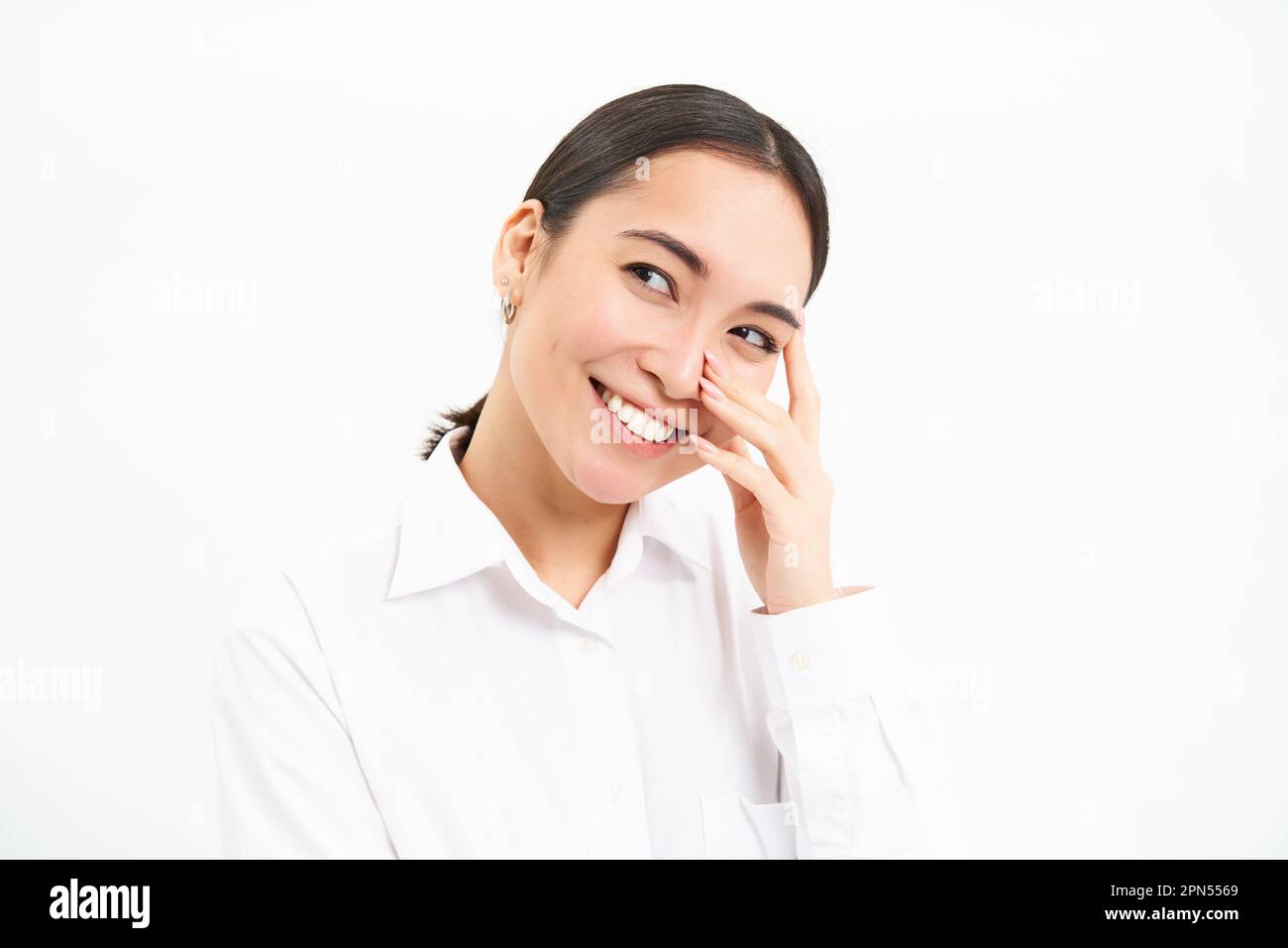 Beautiful young korean woman, laughing and smiling, showing sincere ...
