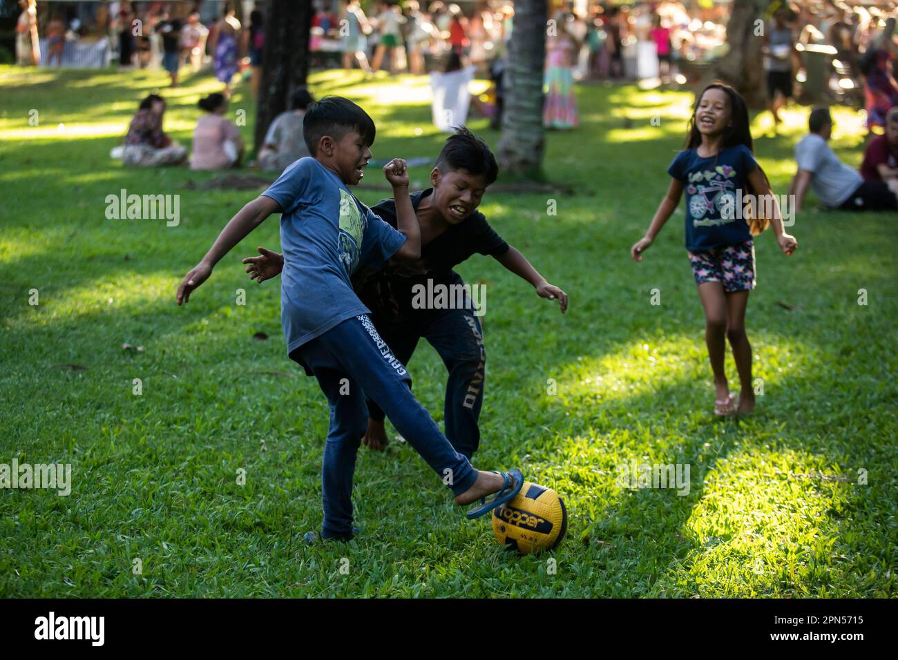 Indigenous children play soccer during Indigenous Peoples' Day ...