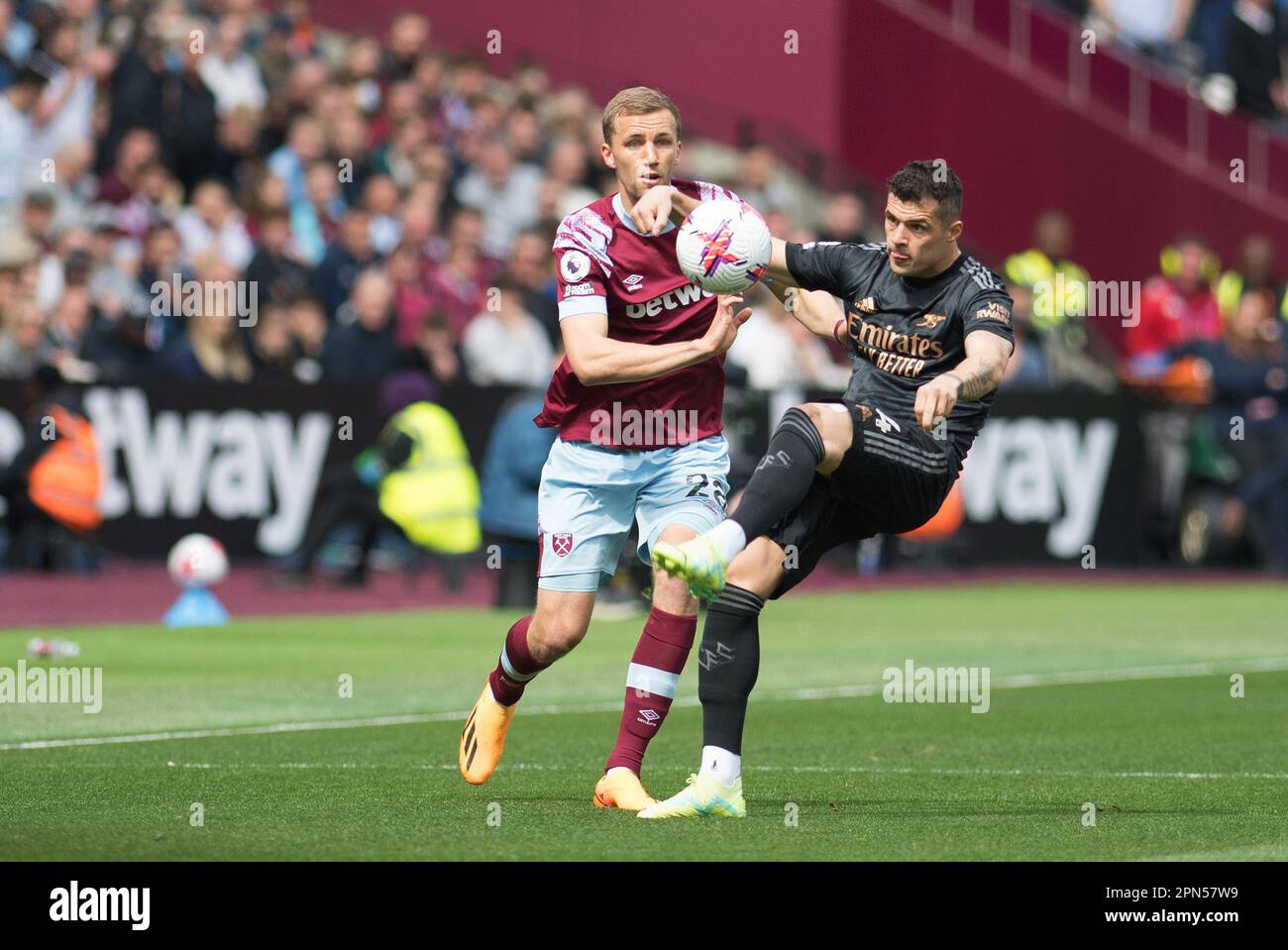 London, UK. 16th Apr, 2023. Tomas Soucek of West Ham Utd (l) and Granit ...