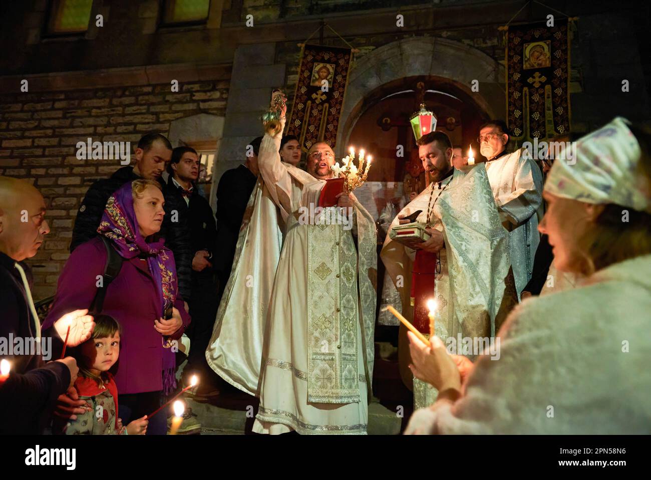 The Orthodox priest Georges Ashkov, with incense, announces that Christ ...