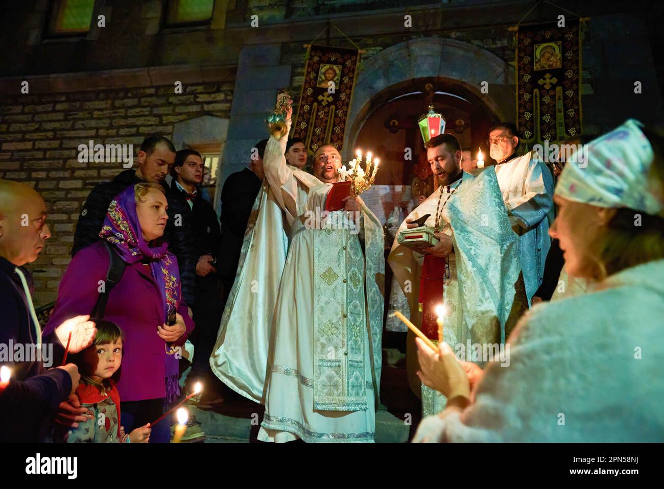 The Orthodox priest Georges Ashkov, with incense, announces that Christ ...