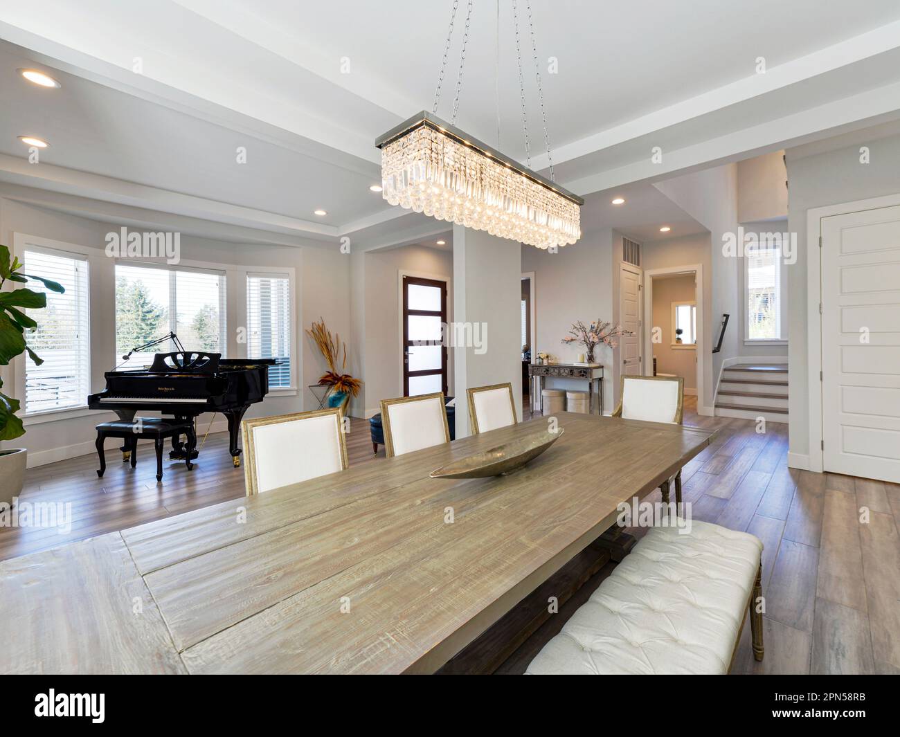 Modern residential dining room and living room interior Stock Photo - Alamy