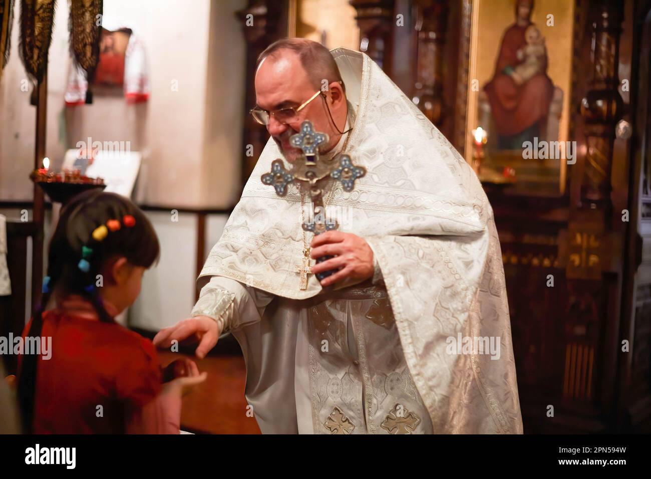 Biarritz, France. 16th Apr, 2023. Orthodox priest Georges Ashkov puts ...