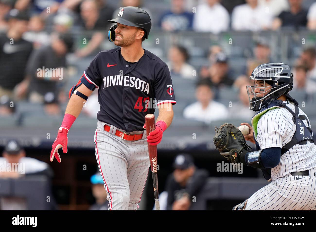 Minnesota Twins' Edouard Julien reacts after striking out against New ...