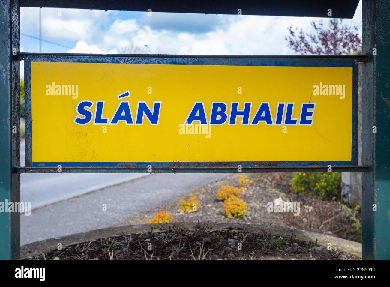 Goodbye sign closeup outside Tipperary Town, Ireland. Sign written in ...
