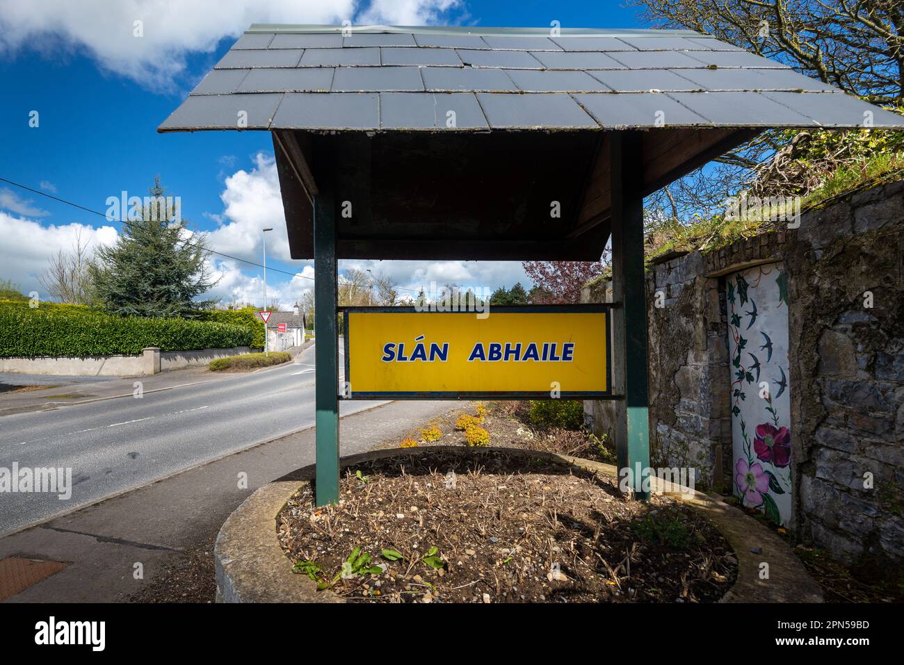 Goodbye exit sign outside Tipperary Town, Ireland. Sign written in ...