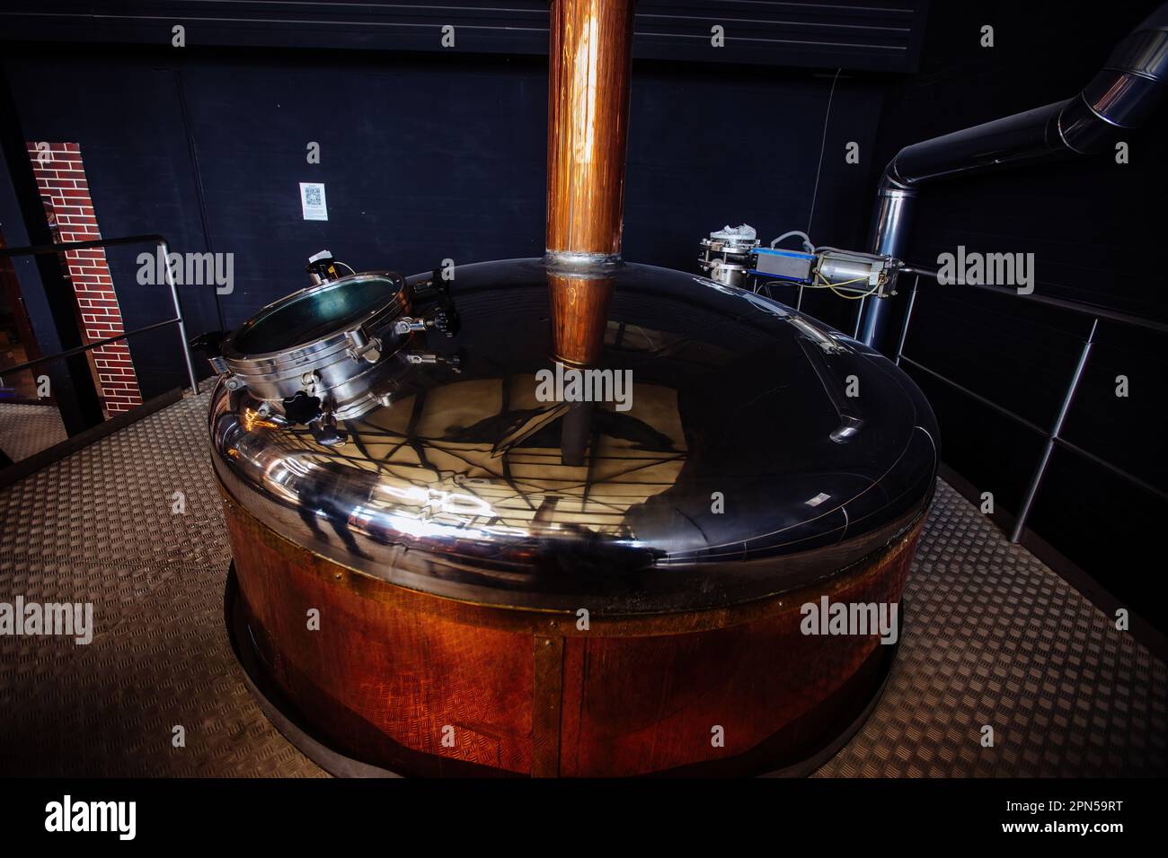 Craft beer production line. Steel tank for mash fermentation in modern ...