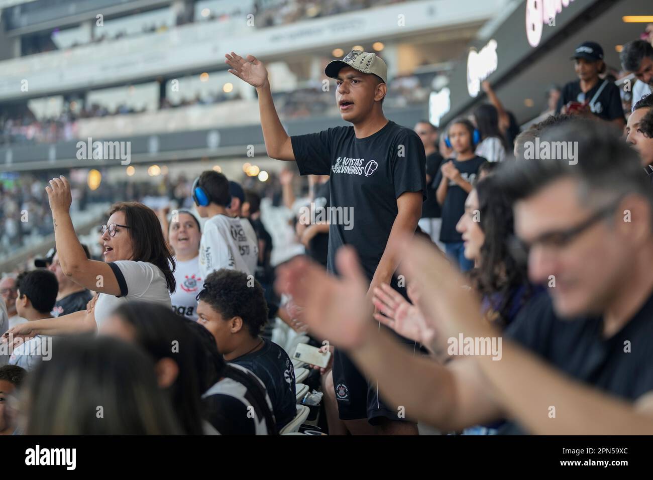 A Corinthians soccer fan with autism spectrum disorder watches a ...