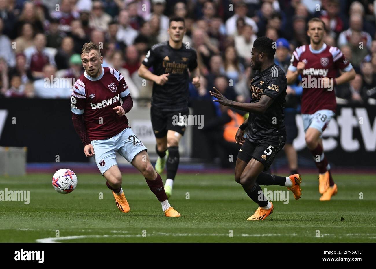 London, UK. 16th Apr, 2023. Jarrod Bowen (West Ham) and Thomas Partey ...