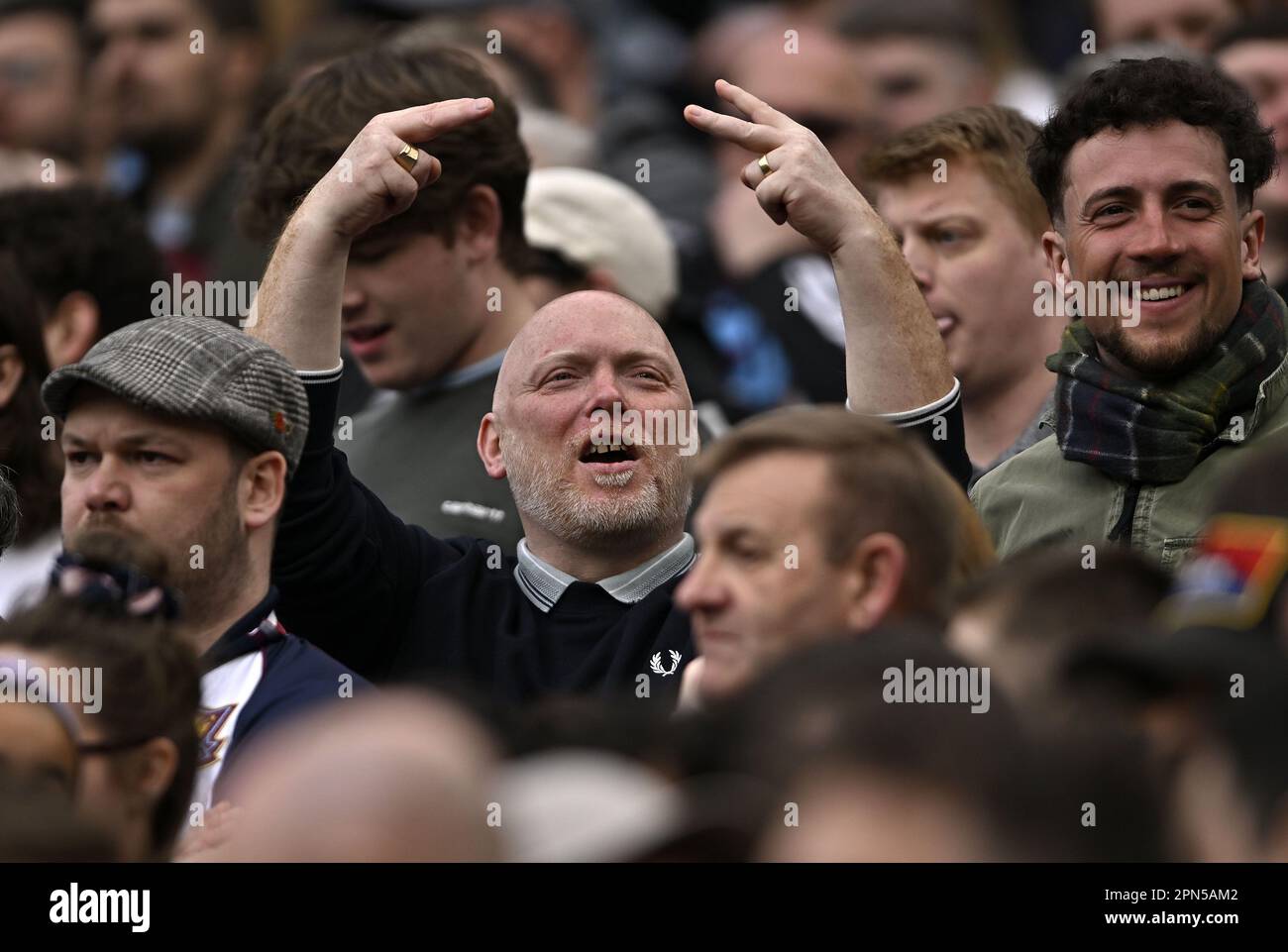 London, UK. 16th Apr, 2023. A West Ham fan gives the victory salute ...