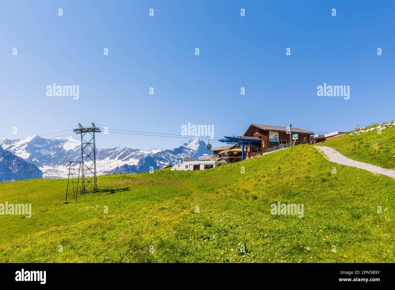 View of the gondola cable car lift station at Grindelwald-First and the ...