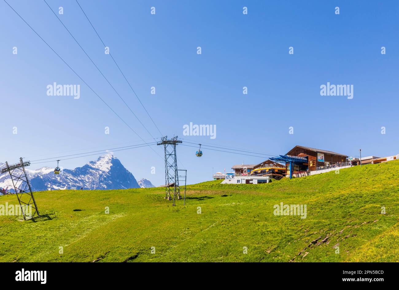 View of the gondola cable car lift station at Grindelwald-First and the ...