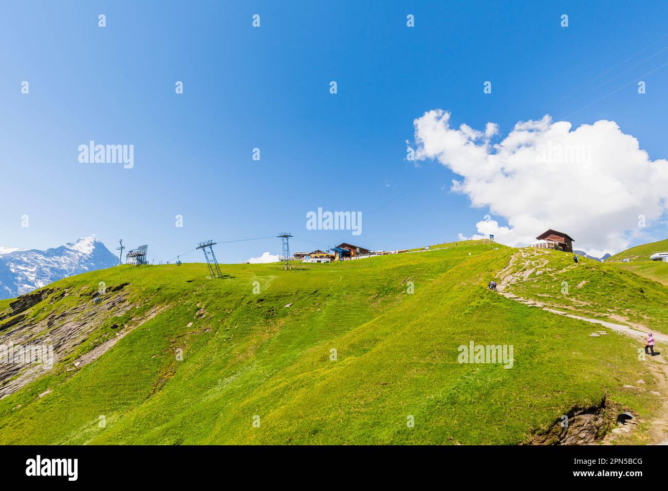 View of the gondola cable car lift station at Grindelwald-First and the ...