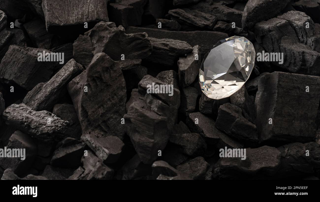 Sparkling diamond amidst black coal background with copy space concept ...
