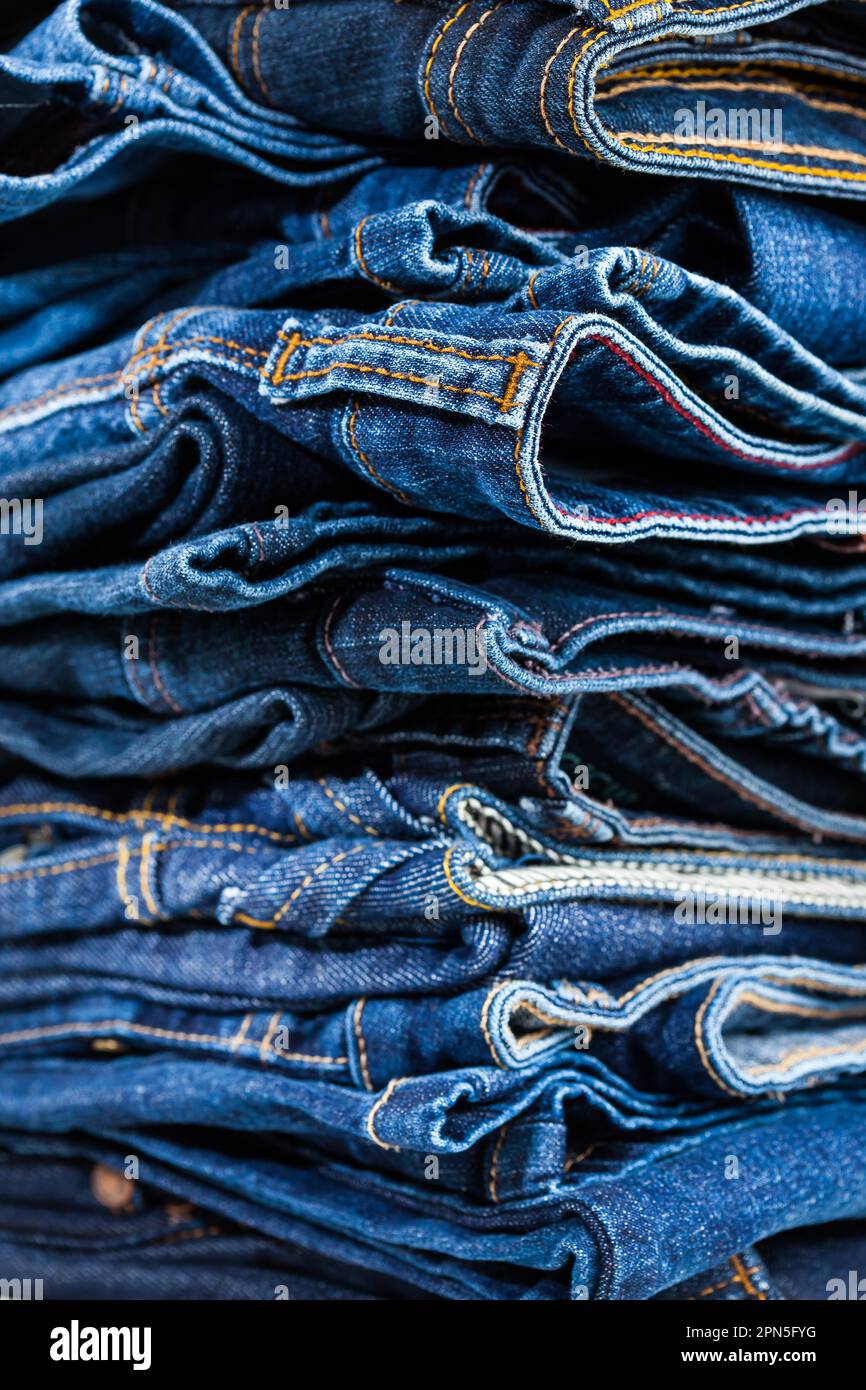 Stack pile denim jeans hi-res stock photography and images - Alamy