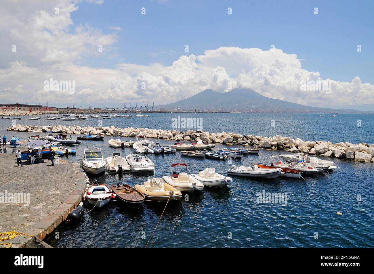 Small boats, harbour, volcano Vesuvio in the background, Naples ...