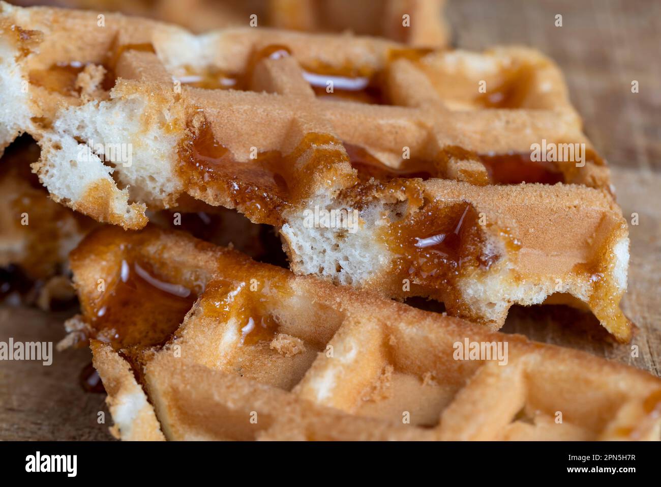 Soft fresh waffles bee hi-res stock photography and images - Alamy